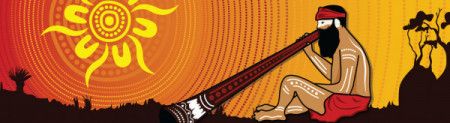 Aboriginal man playing a traditional musical instrument didgeridoo ...
